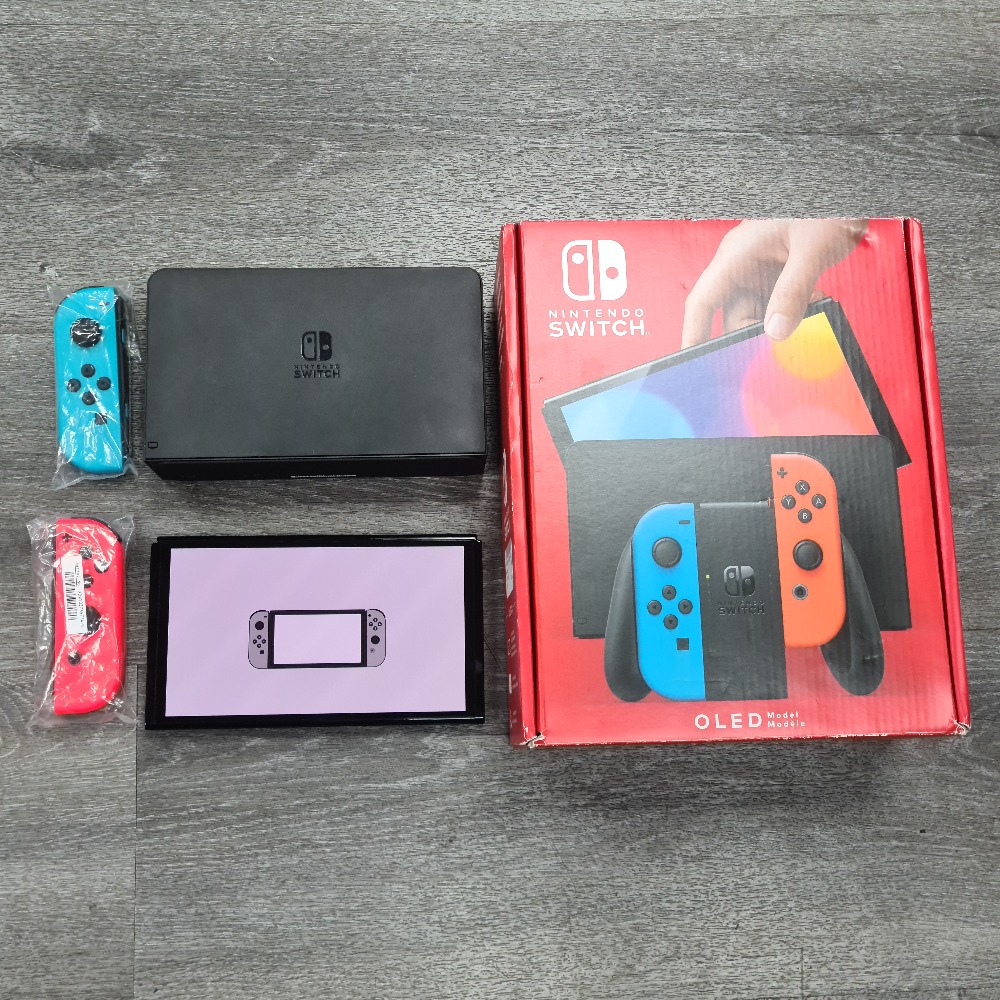 Pre-owned Nintendo Switch OLED with Blue & Red Joycons (Boxed) - Own4Less